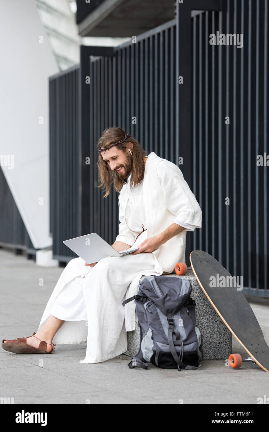 Young jesus using laptop hi-res stock photography and images - Alamy