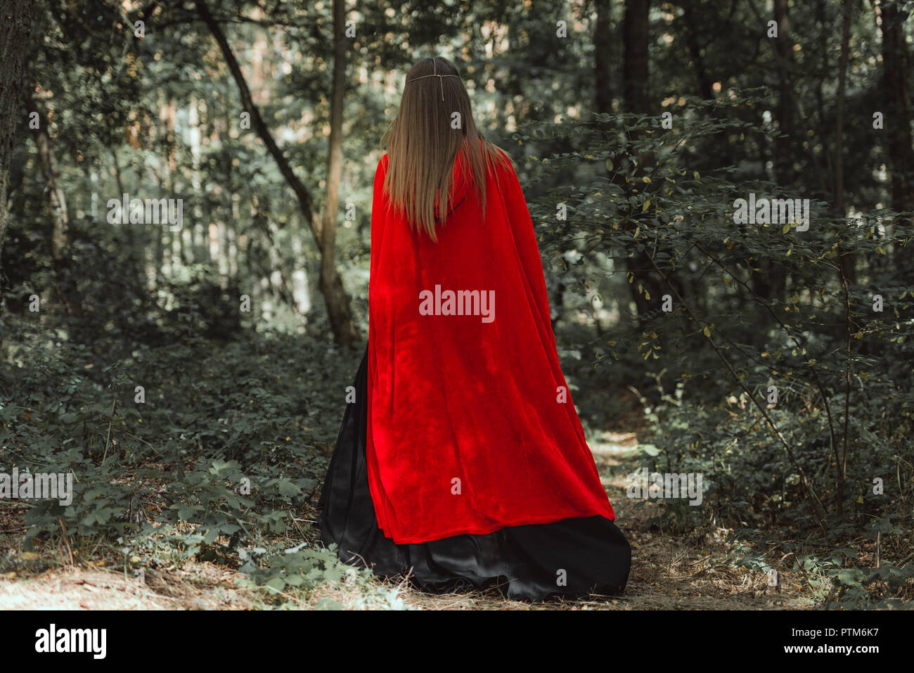Woman cloak rear view hi-res stock photography and images - Alamy