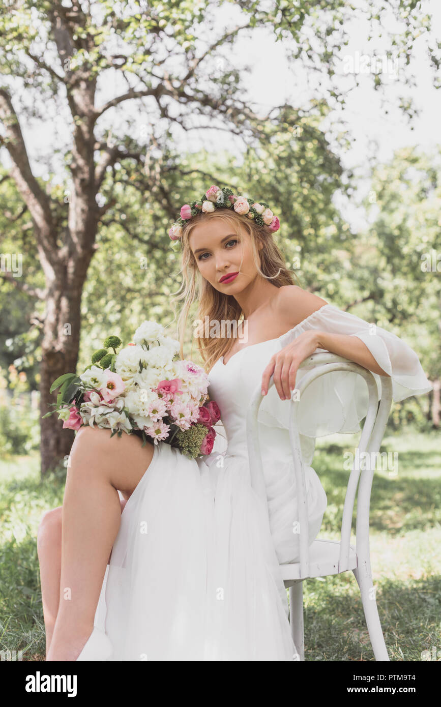 Bride sitting on chair hi-res stock photography and images - Alamy