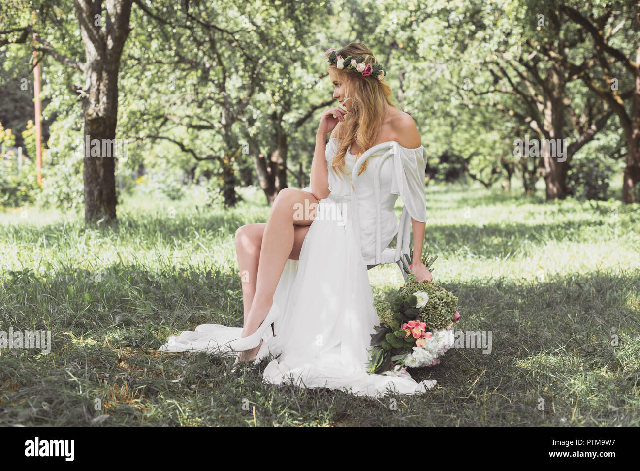 Bride sitting on chair hi-res stock photography and images - Alamy