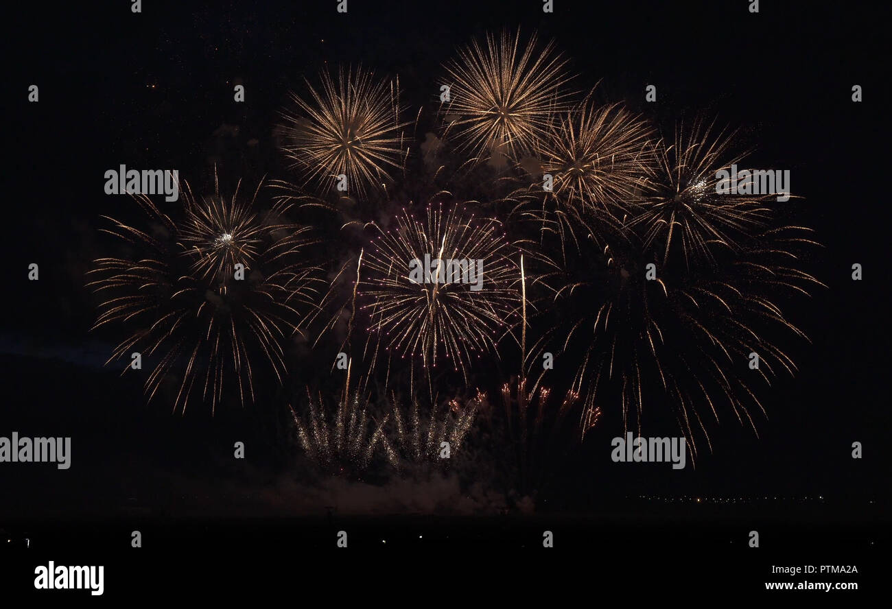 Colorful fireworks on the black sky background Stock Photo - Alamy