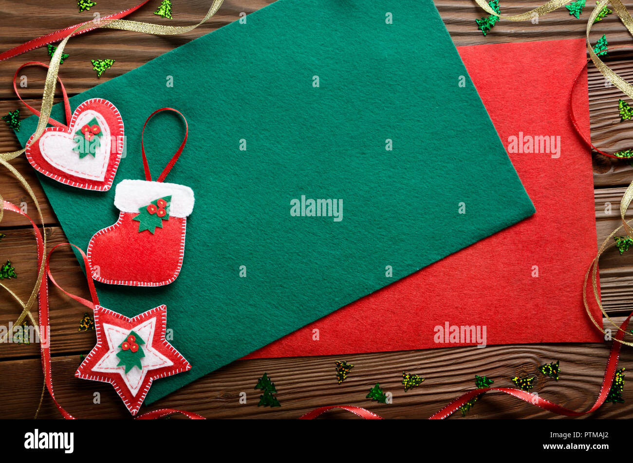 Handmade rustic Christmas tree decorations with red and green felt on ...