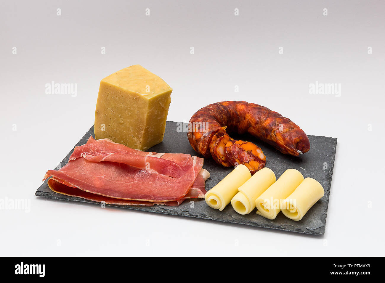 Faux Matte Granite Display With Cheese Chorizo and Ham Stock Photo - Alamy