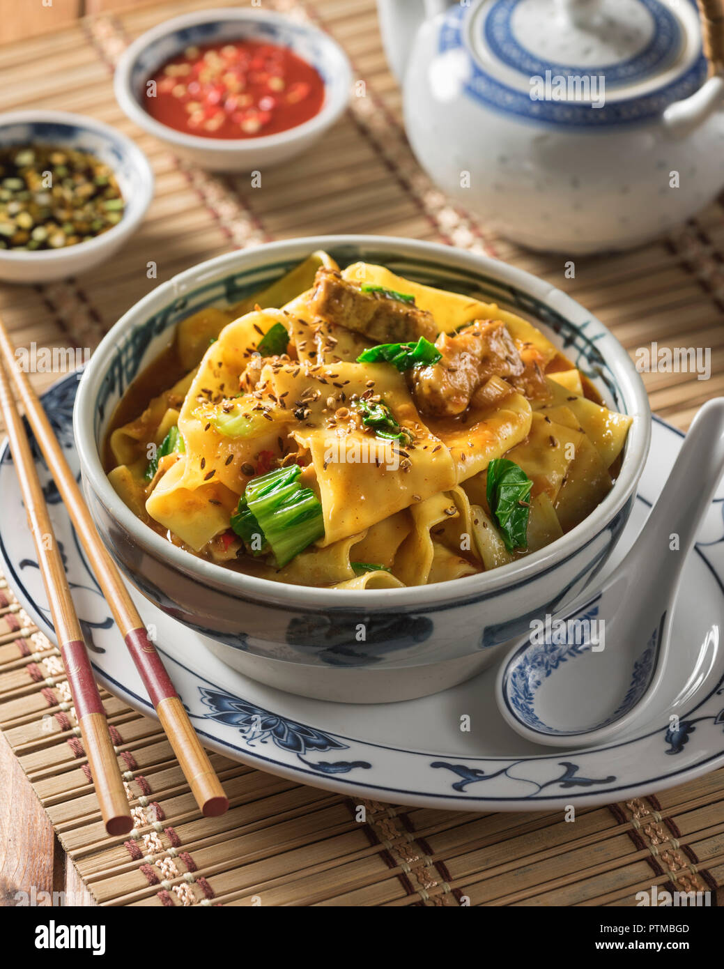 Biang biang noodles. Spicy regional Chinese food Stock Photo - Alamy