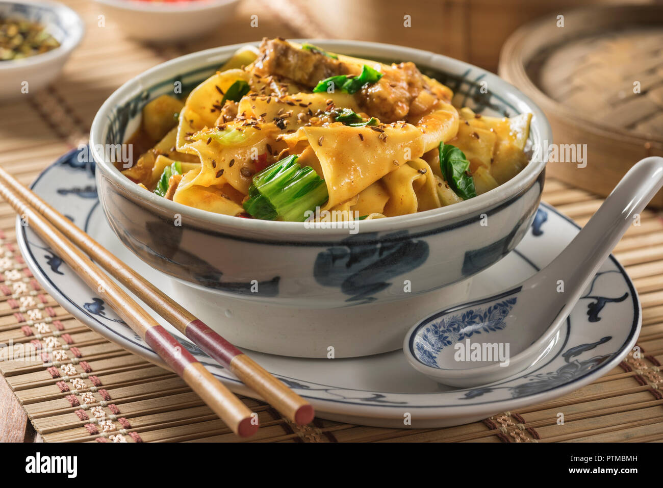Biang biang noodles. Spicy regional Chinese food Stock Photo - Alamy