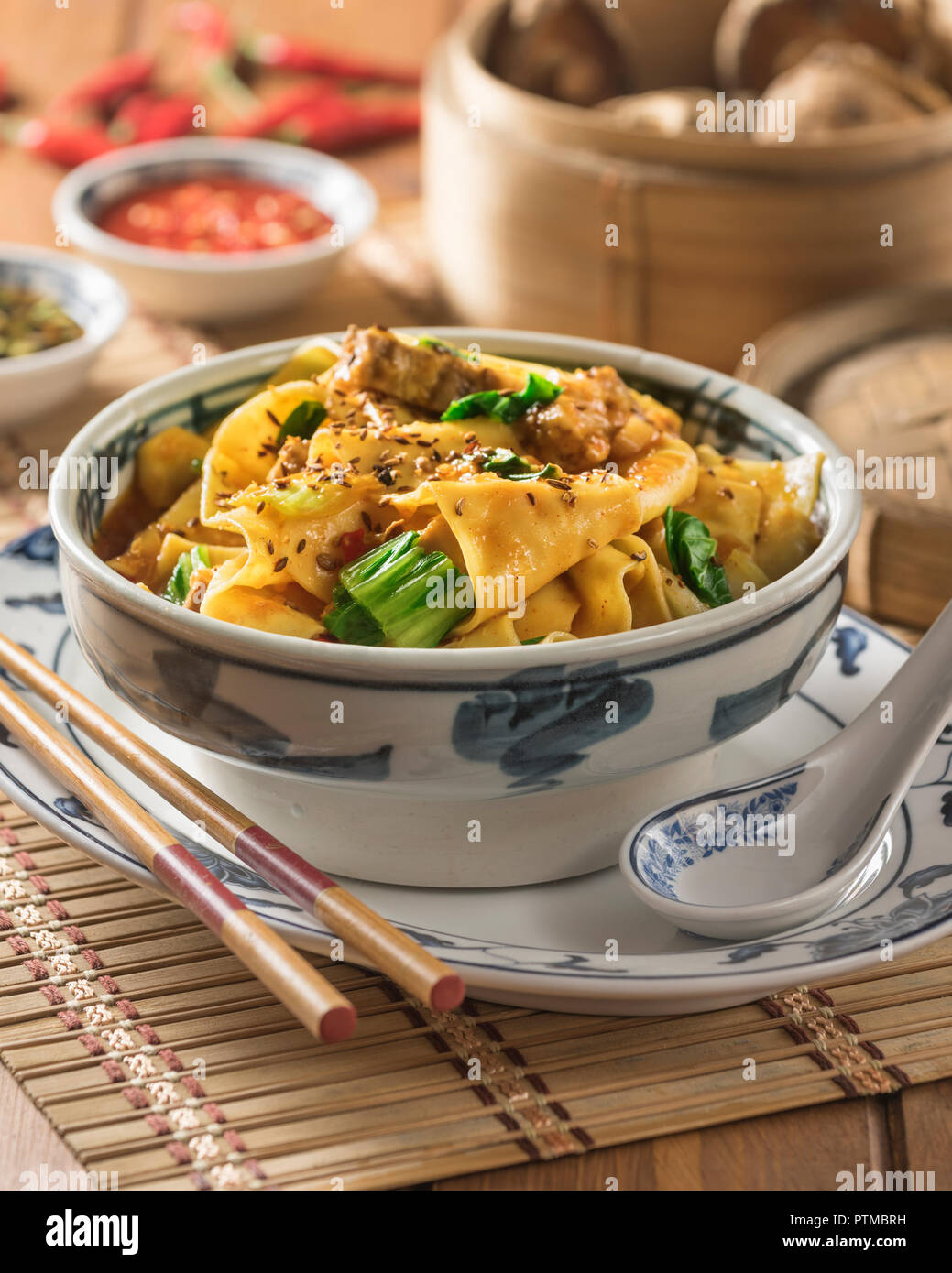 Biang biang noodles. Spicy regional Chinese food Stock Photo - Alamy