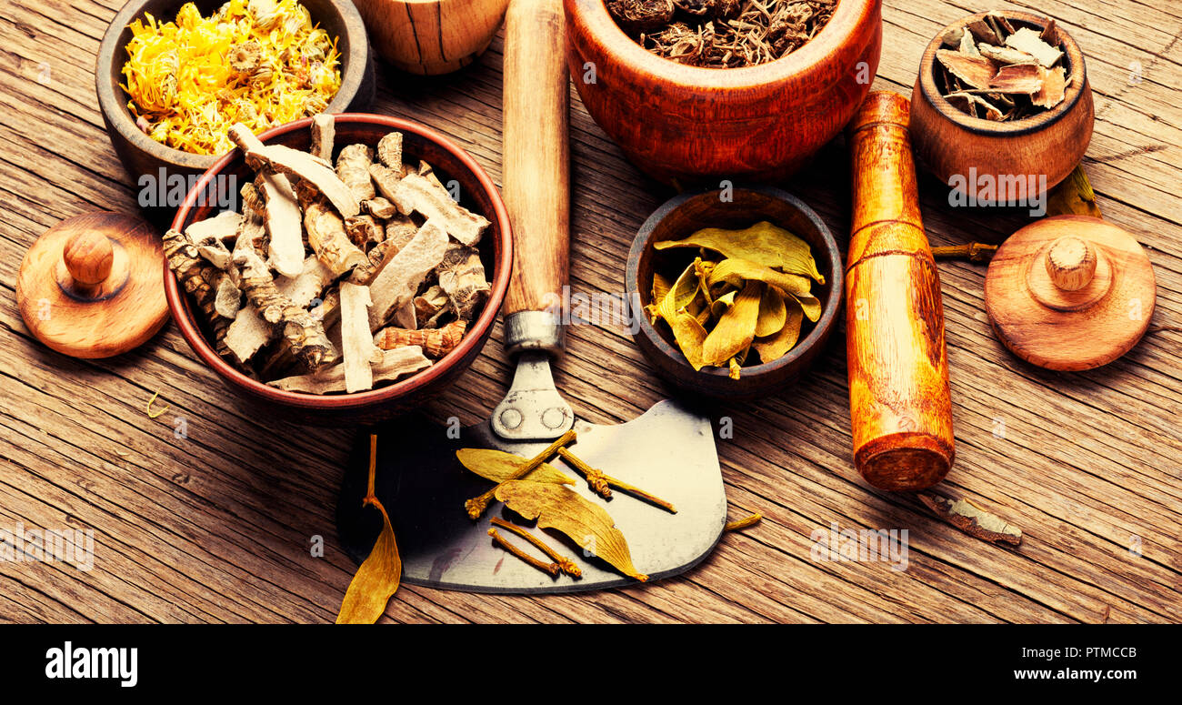 Medicinal herbs plants in wooden bowl hi-res stock photography and ...