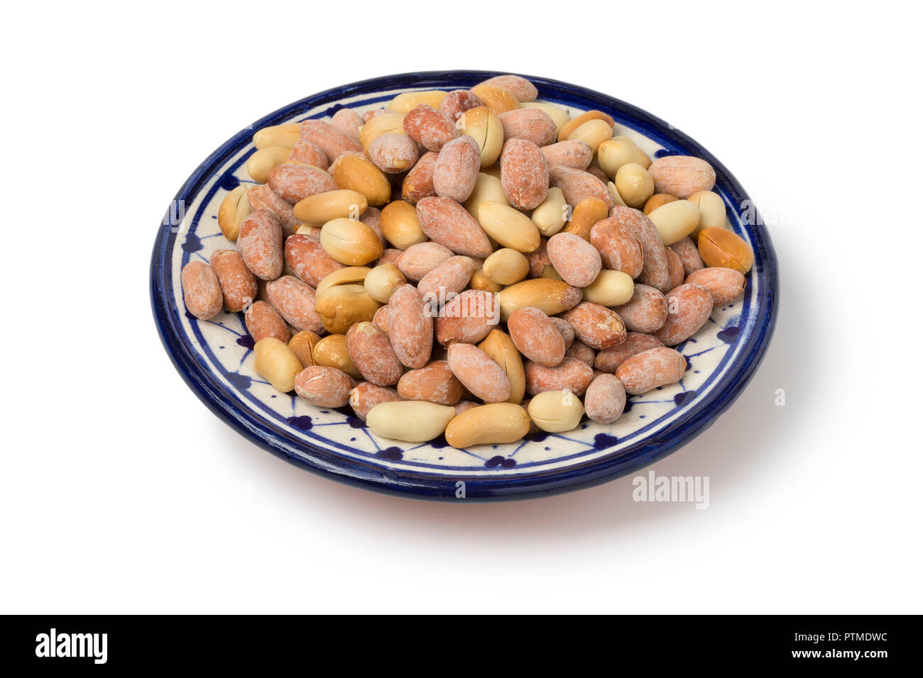 Bowl with traditional Moroccan roasted peanuts isolated on white ...