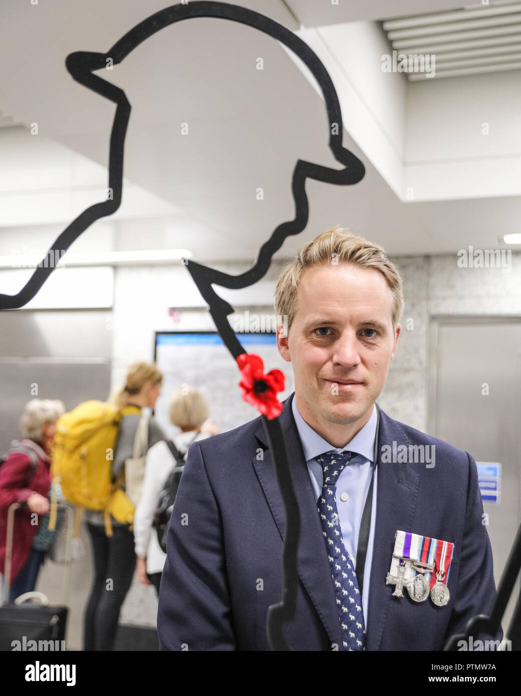 Victoria Station, London, 10th Oct 2018. Charity director Rowley Gregg ...