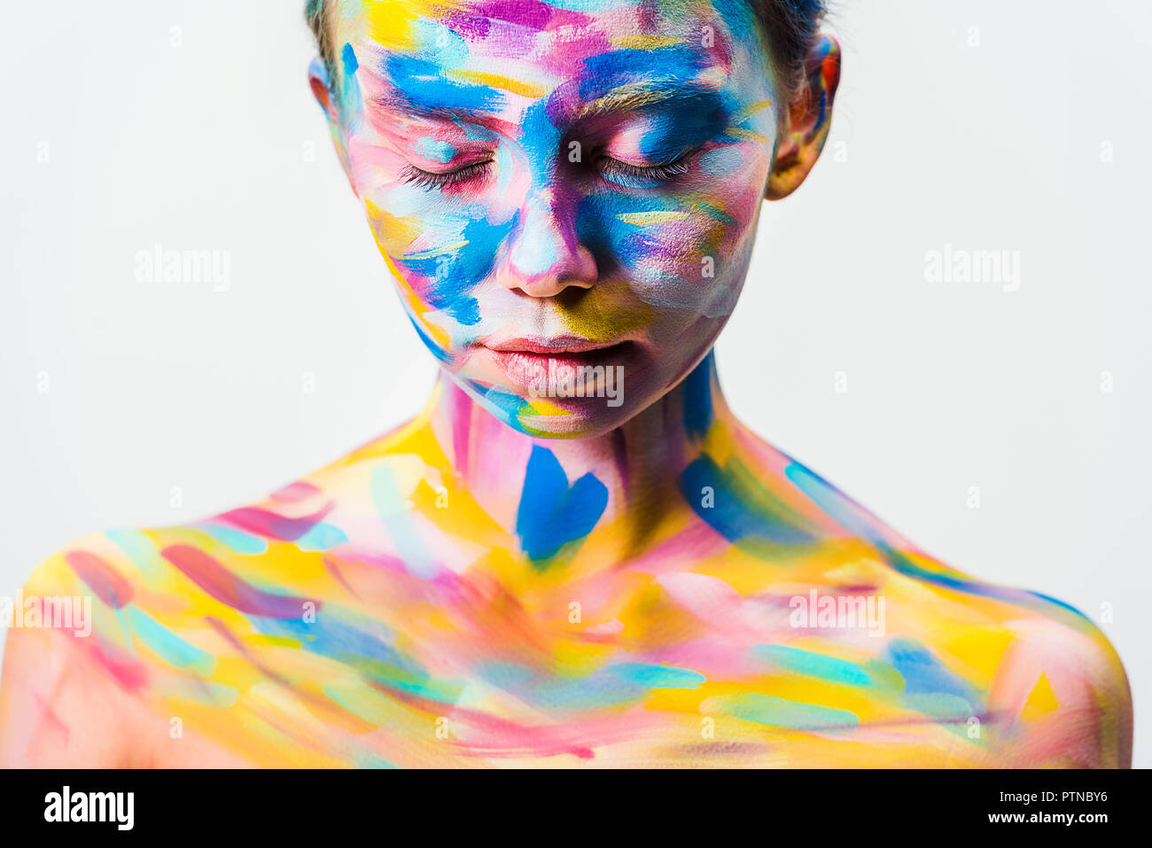attractive girl with colorful bright body art and closed eyes isolated ...