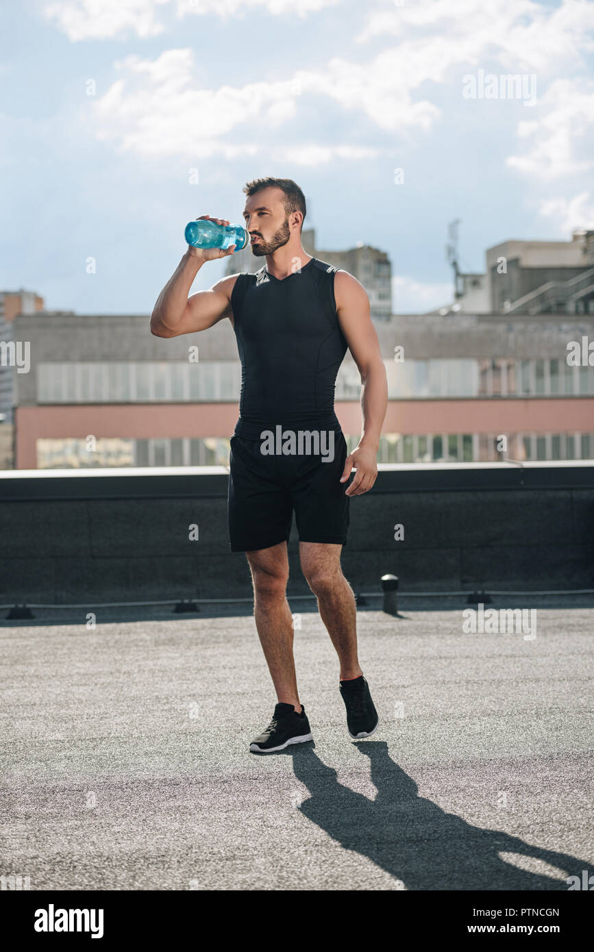 Drinking water after working out hi-res stock photography and images ...