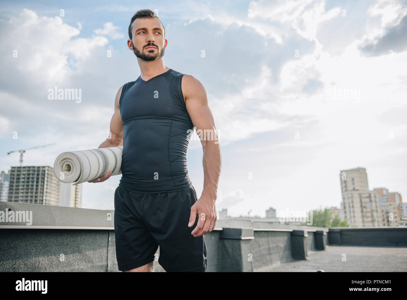 Standing yoga mat hi-res stock photography and images - Alamy