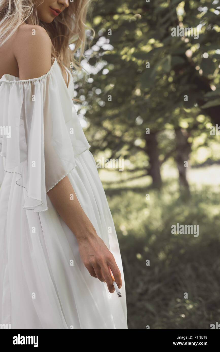 Bride smoking cigarette wedding hi-res stock photography and images - Alamy