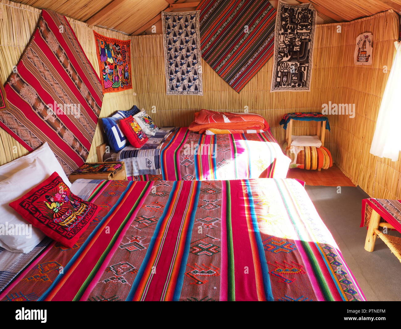 Lake Titicaca straddles the border between Peru and Bolivia in the ...