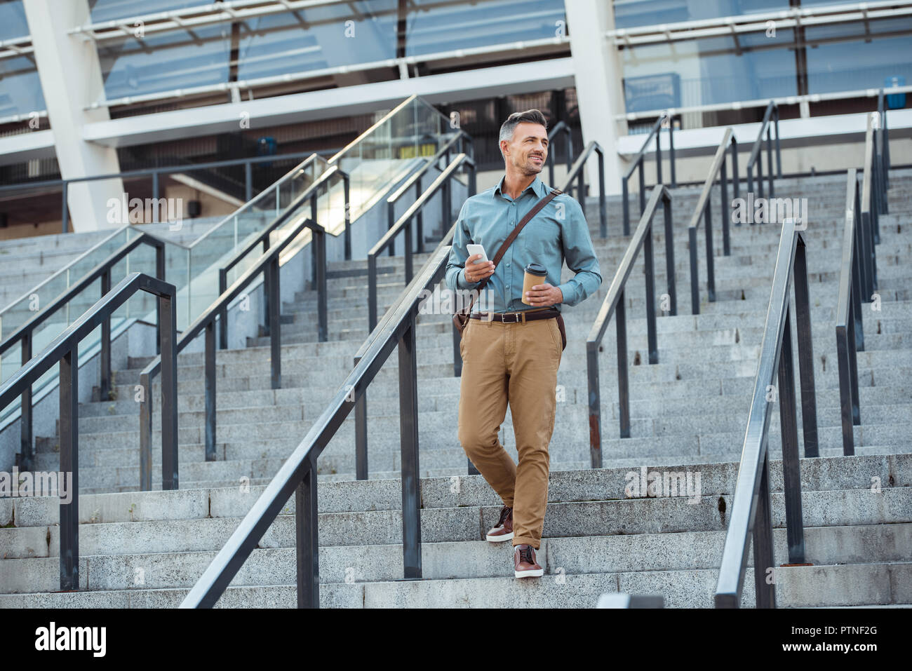 Man walking down street using hi-res stock photography and images - Alamy