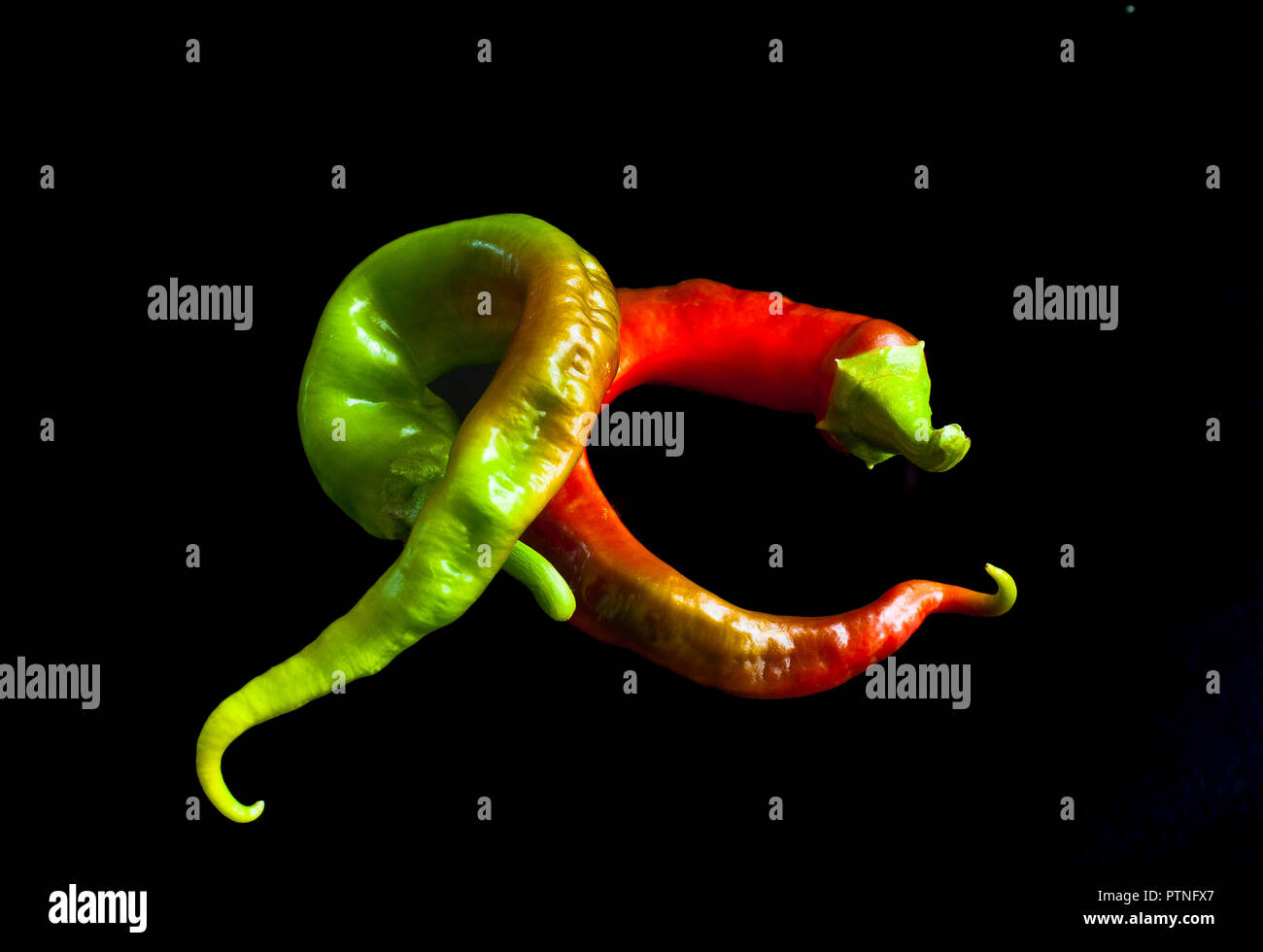 Fresh peppers of different shapes and colors Stock Photo - Alamy