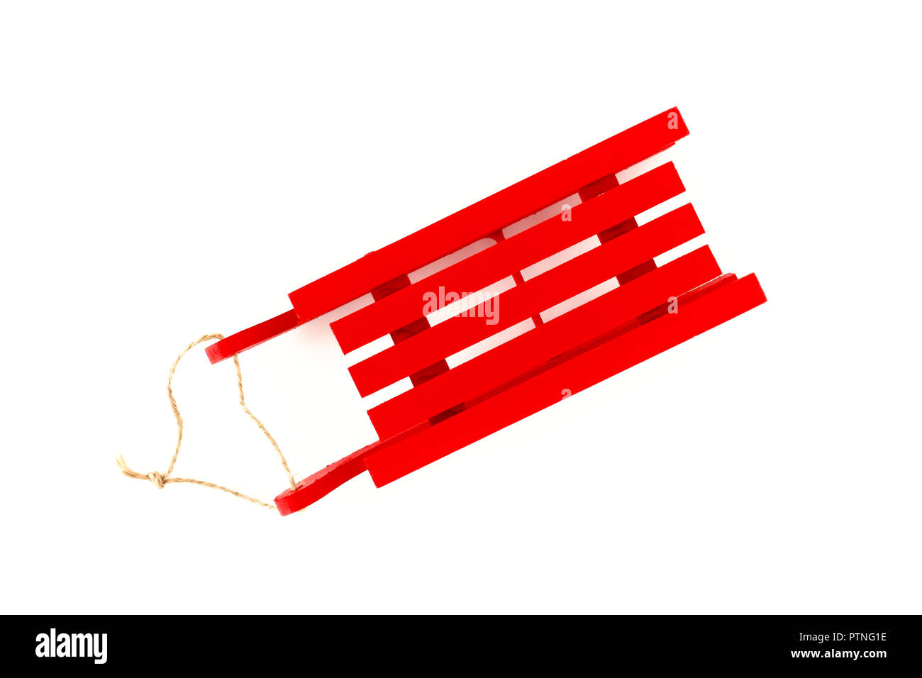 Red wooden sledge on white background with copy space Stock Photo - Alamy