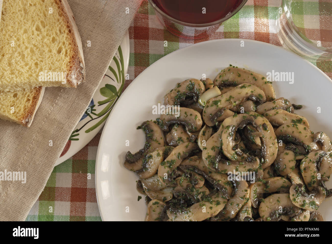 champignons mushrooms sautéed from above with slices of bread Stock ...