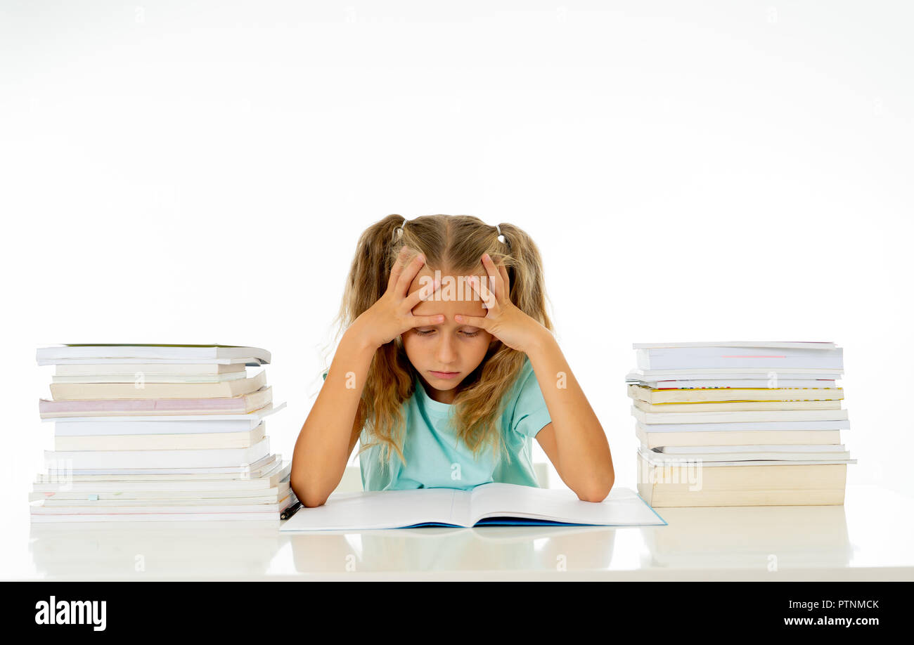 Beautiful school girl trying to study having too many homework that It ...