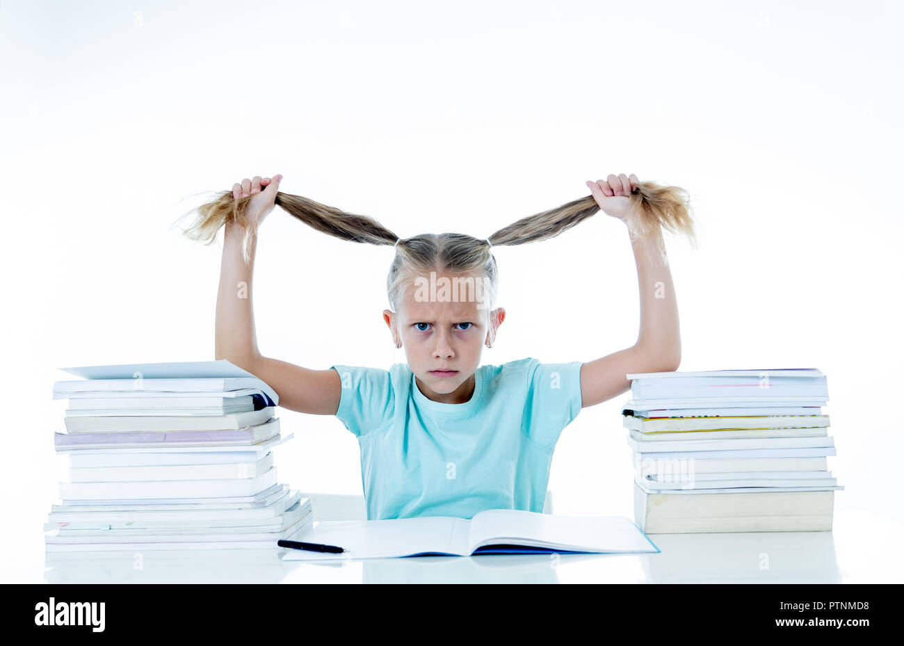 Beautiful school girl trying to study having too many homework that It ...