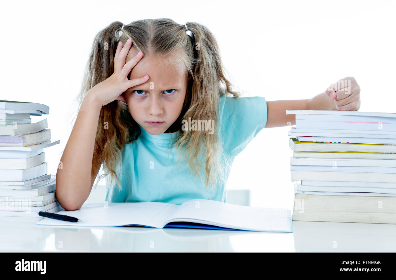 Angry little girl with a negative attitude towards studies and school ...