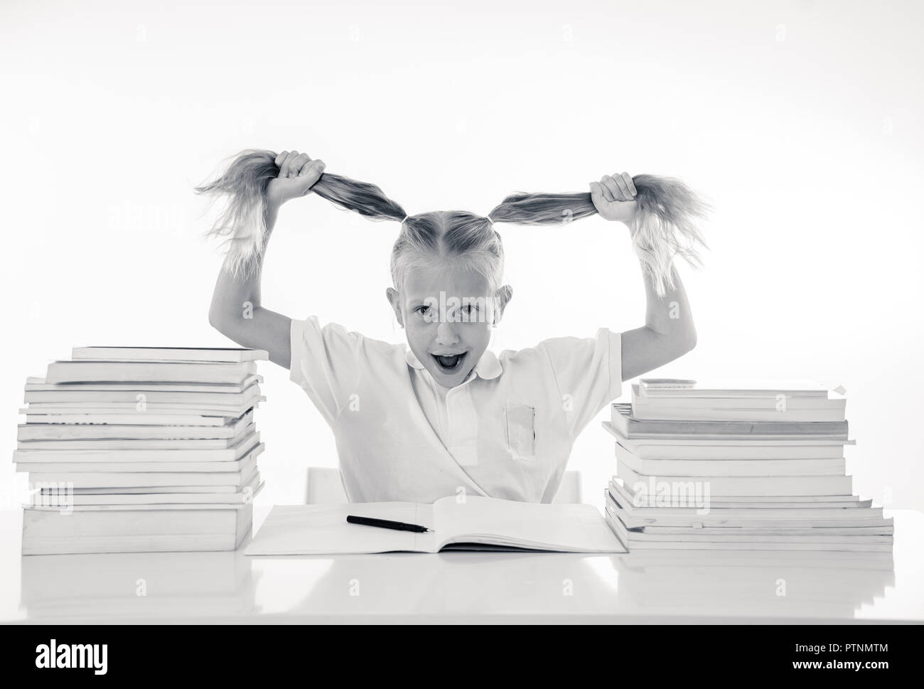 Beautiful school girl trying to study having too many homework that It ...