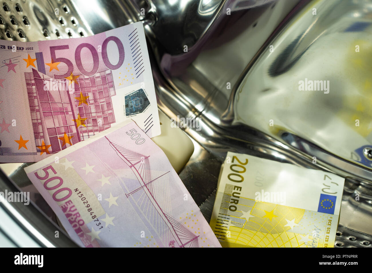 Euro / European currency, high denomination in the washing machine ...