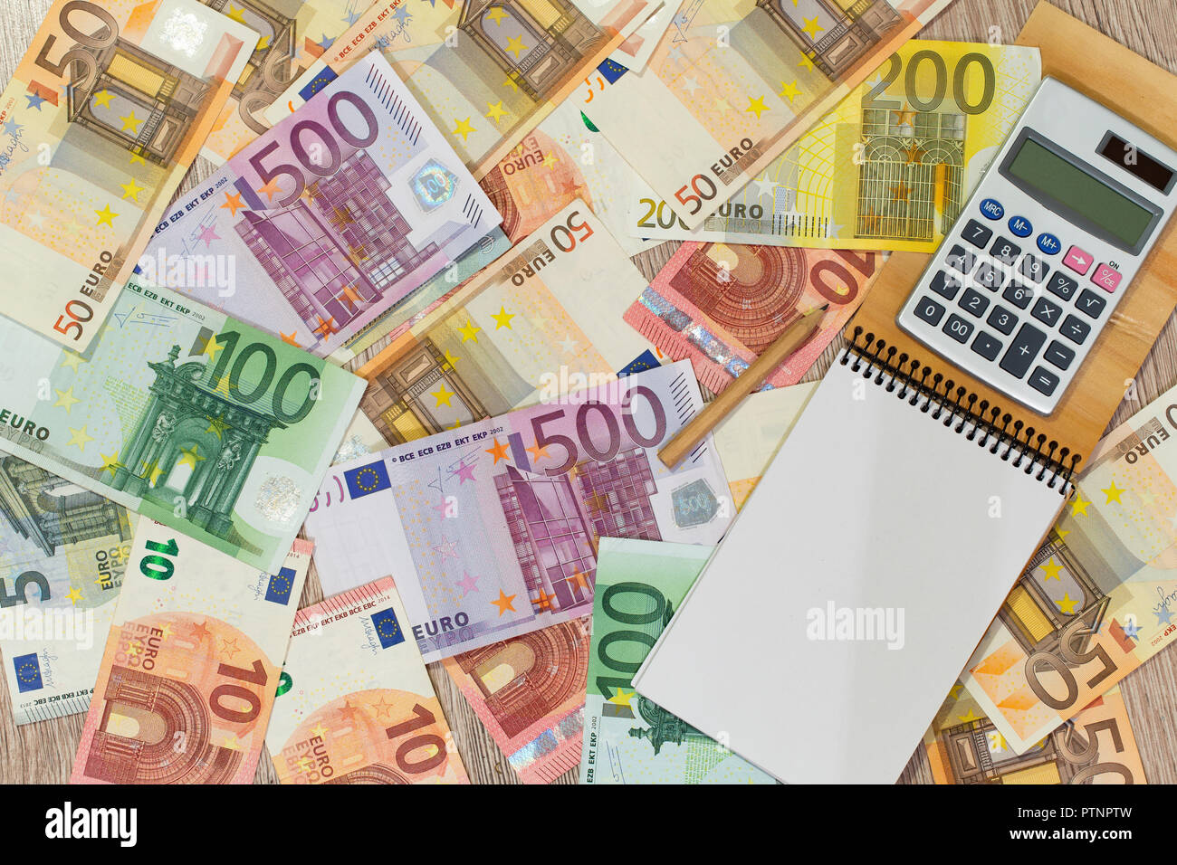 Euro. European money, various denominations with a calculator and a ...