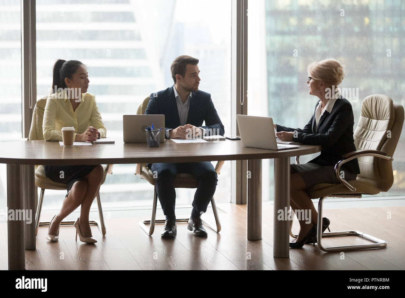 Woman speaking business candid hi-res stock photography and images - Alamy