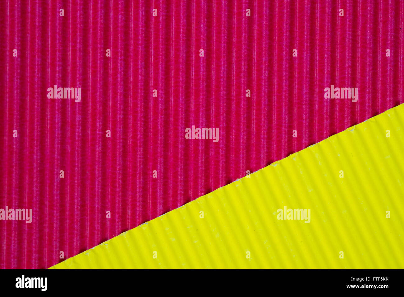 Red and yellow corrugated paper texture, use for background. vivid ...