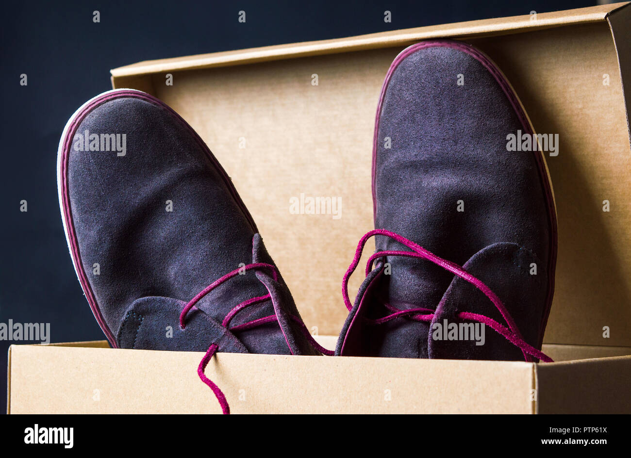Black shoes red box hi-res stock photography and images - Alamy