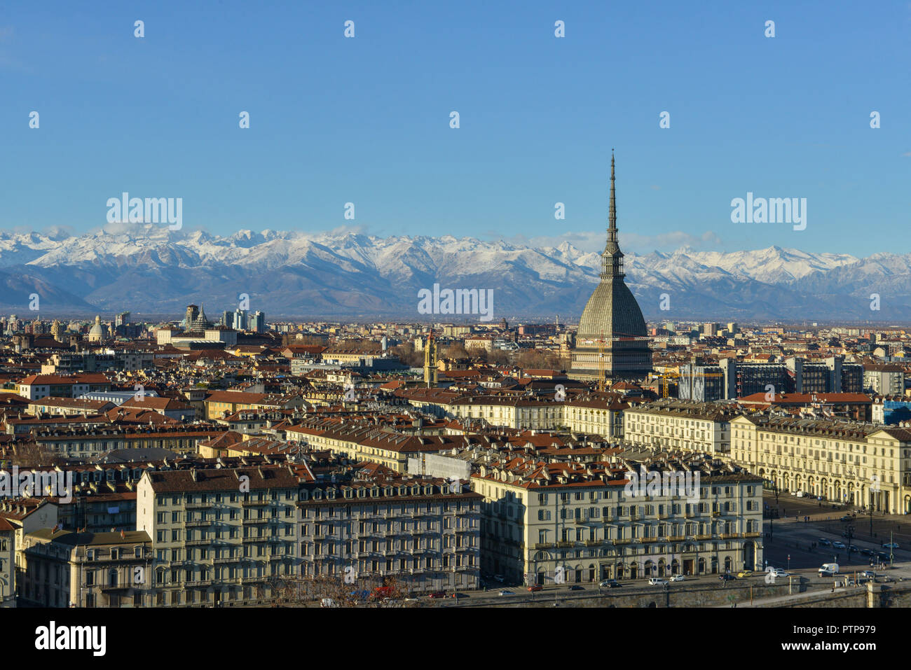 Italy, Turin: overview of the city with the spire of the Mole ...