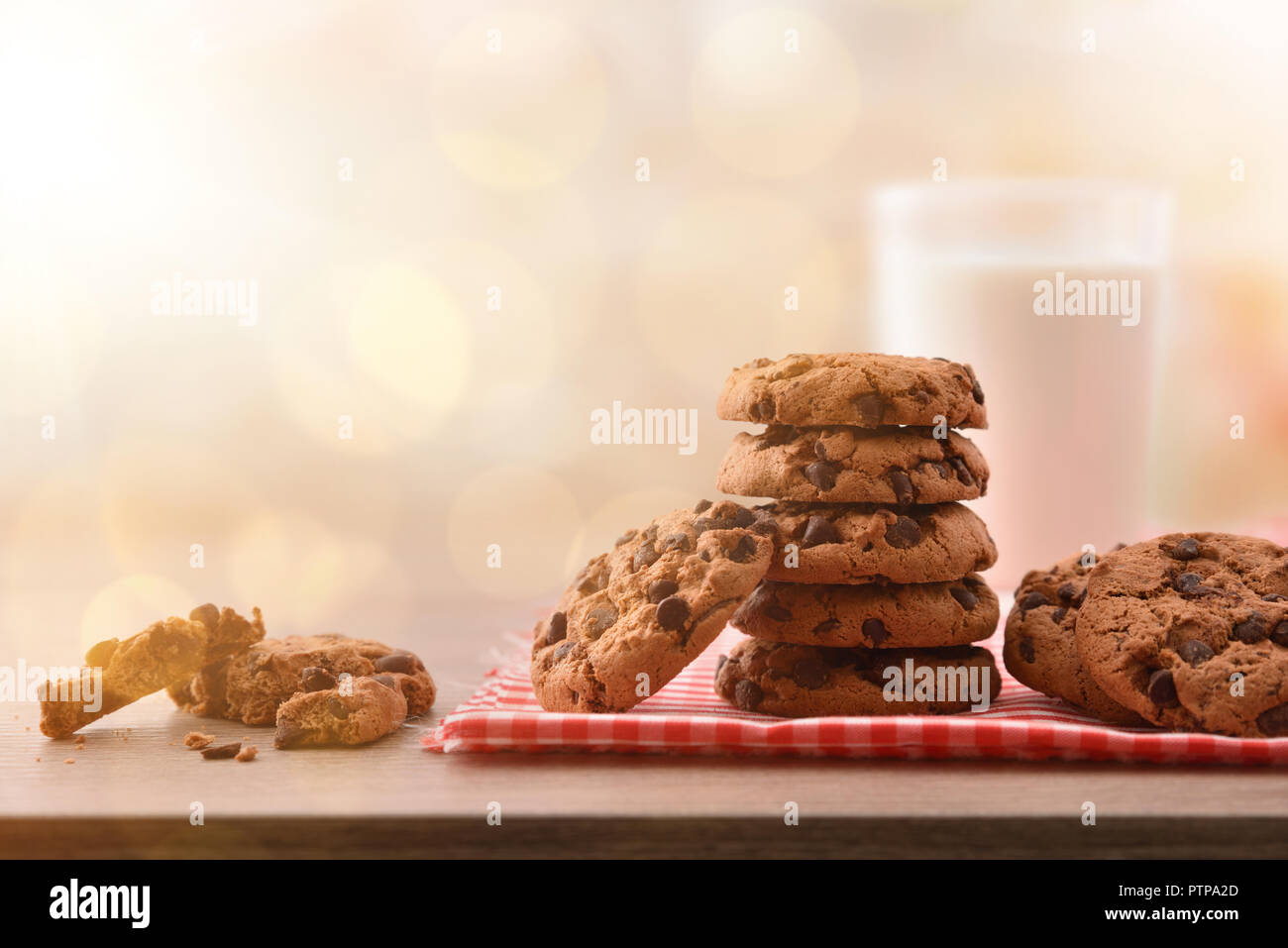 Breakfast with round biscuits with black chocolate nuggets on ...