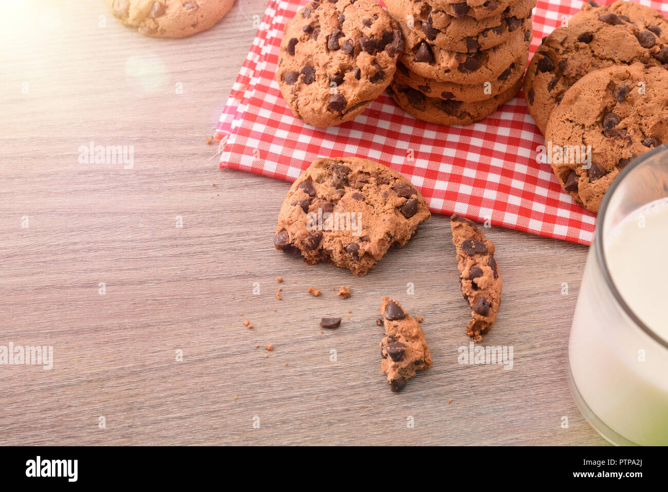 Breakfast with round biscuits with black chocolate nuggets on ...