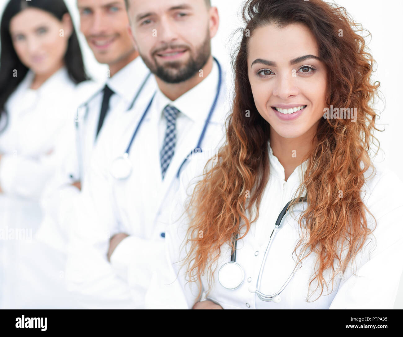 portrait of female doctors with colleagues Stock Photo - Alamy