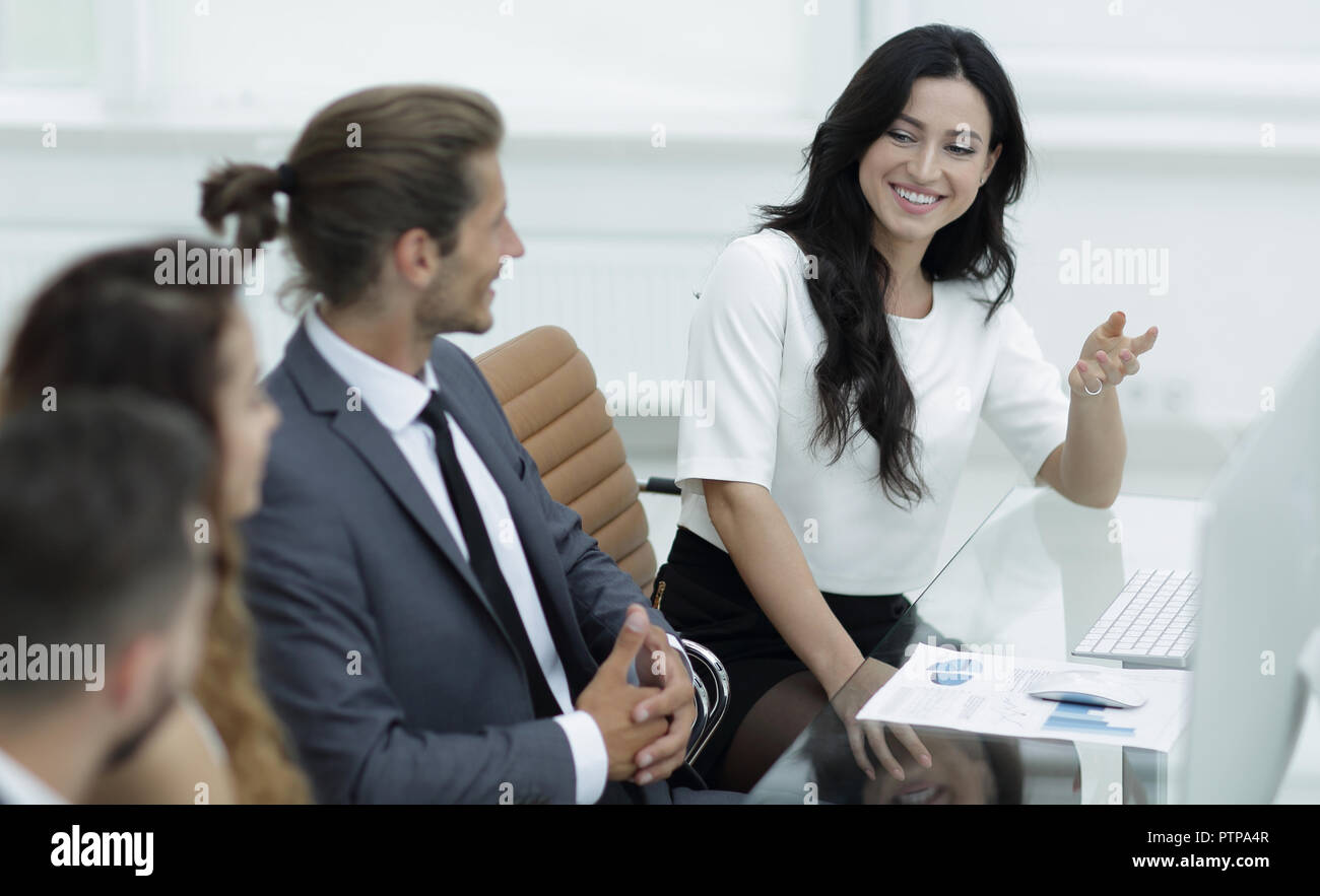 business people communicate at work their Desk Stock Photo - Alamy