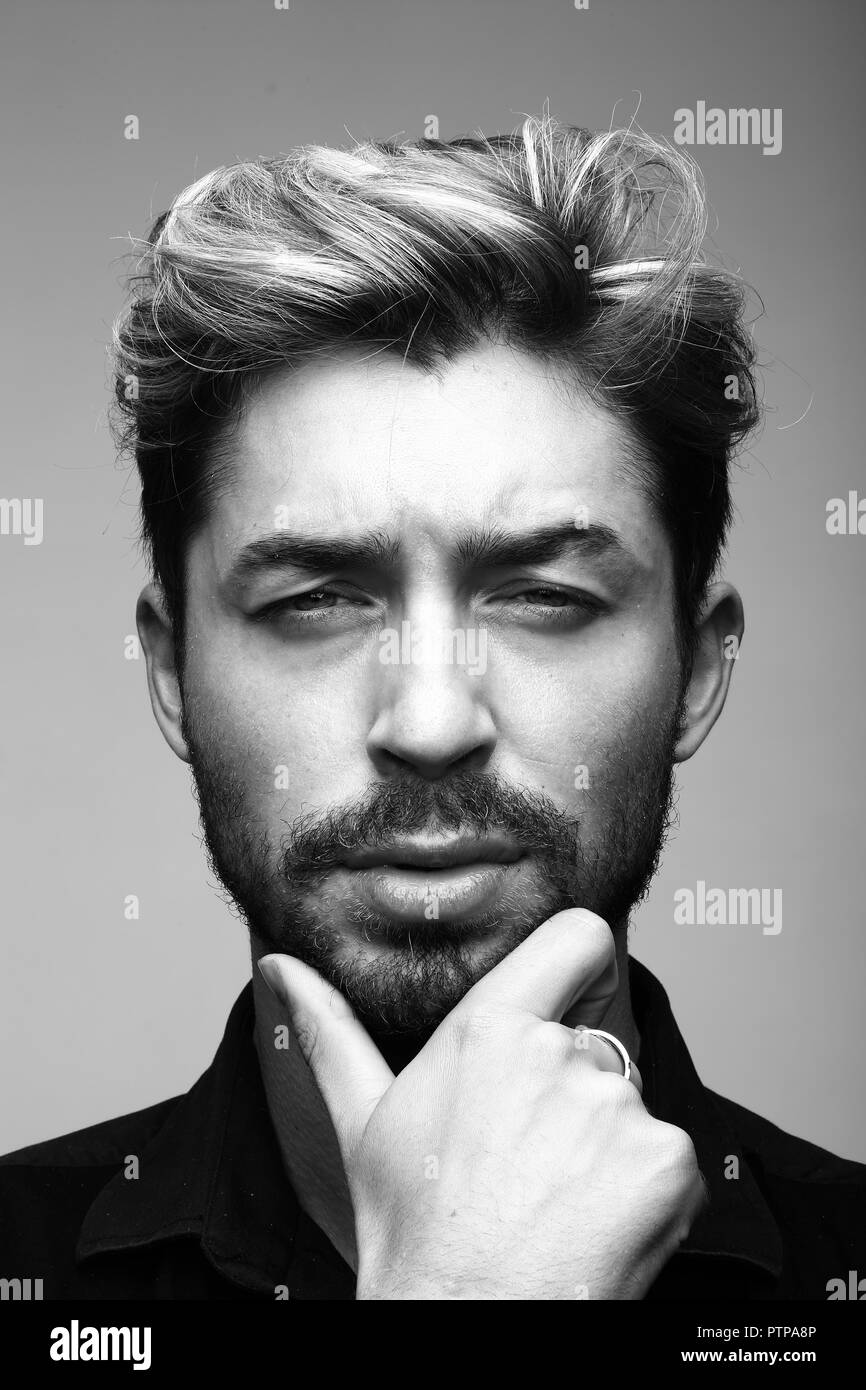 Black and white portrait of a pensive man Stock Photo - Alamy