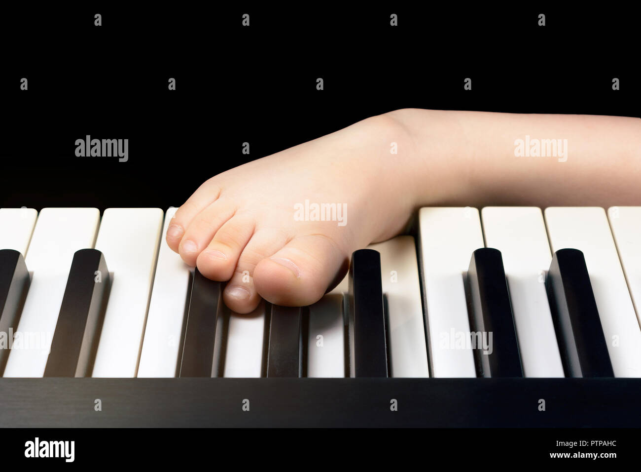 Black childs feet hi-res stock photography and images - Alamy