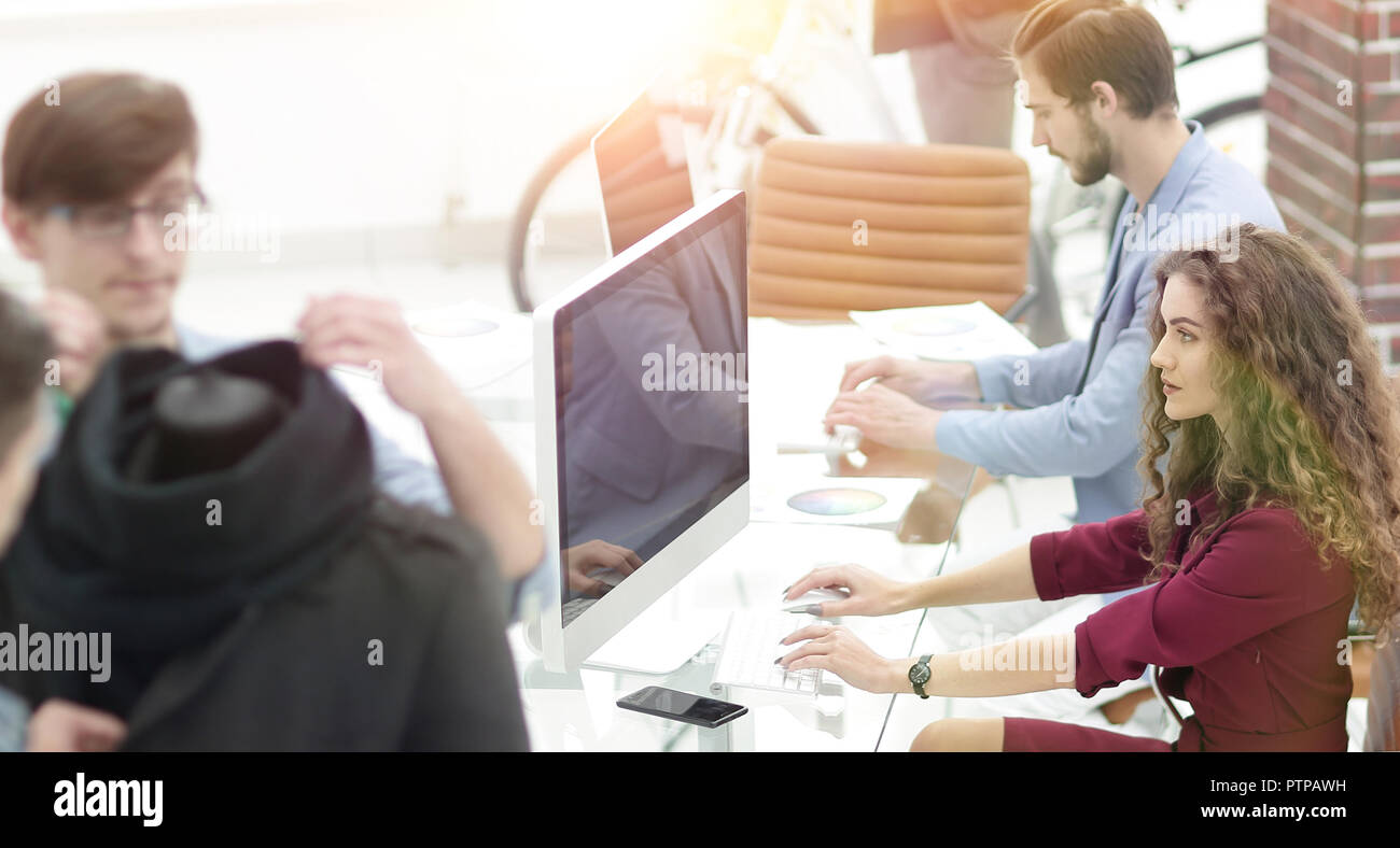 group of designers working in a modern office Stock Photo - Alamy