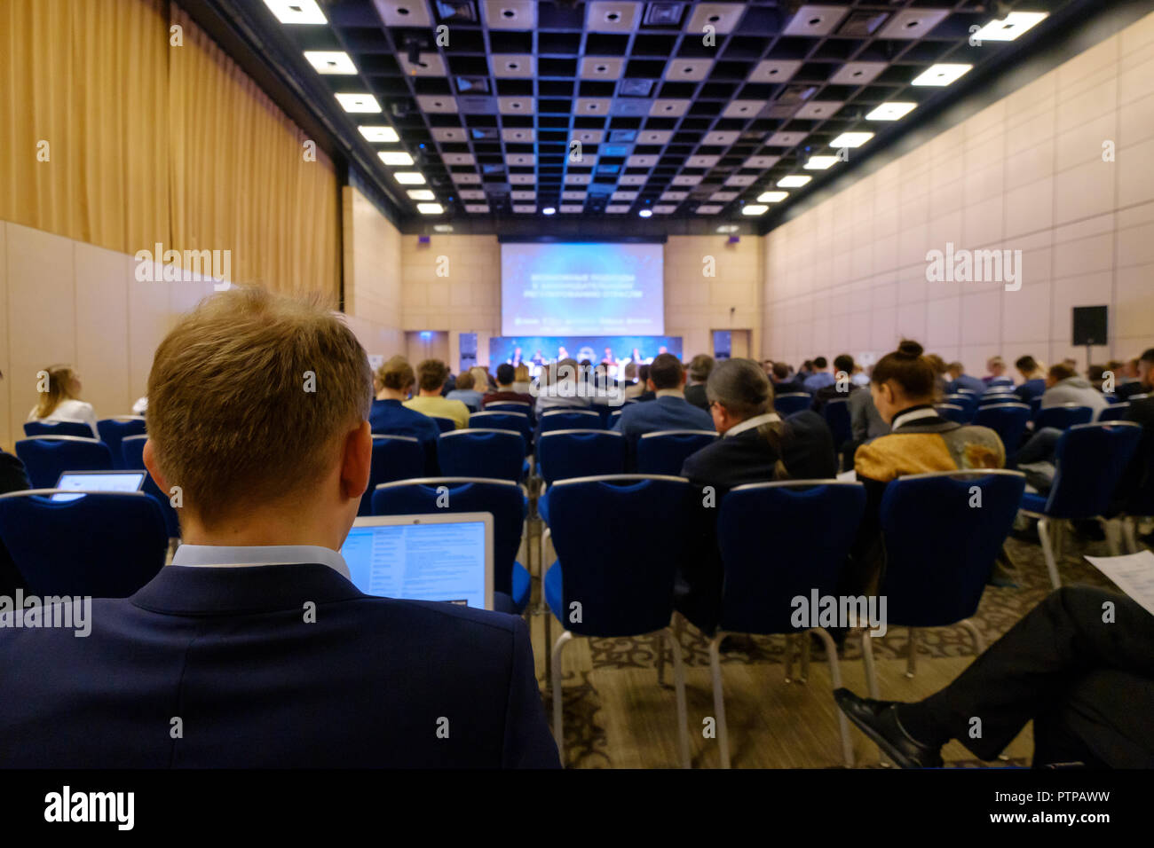 People attend business conference in congress hall Stock Photo - Alamy