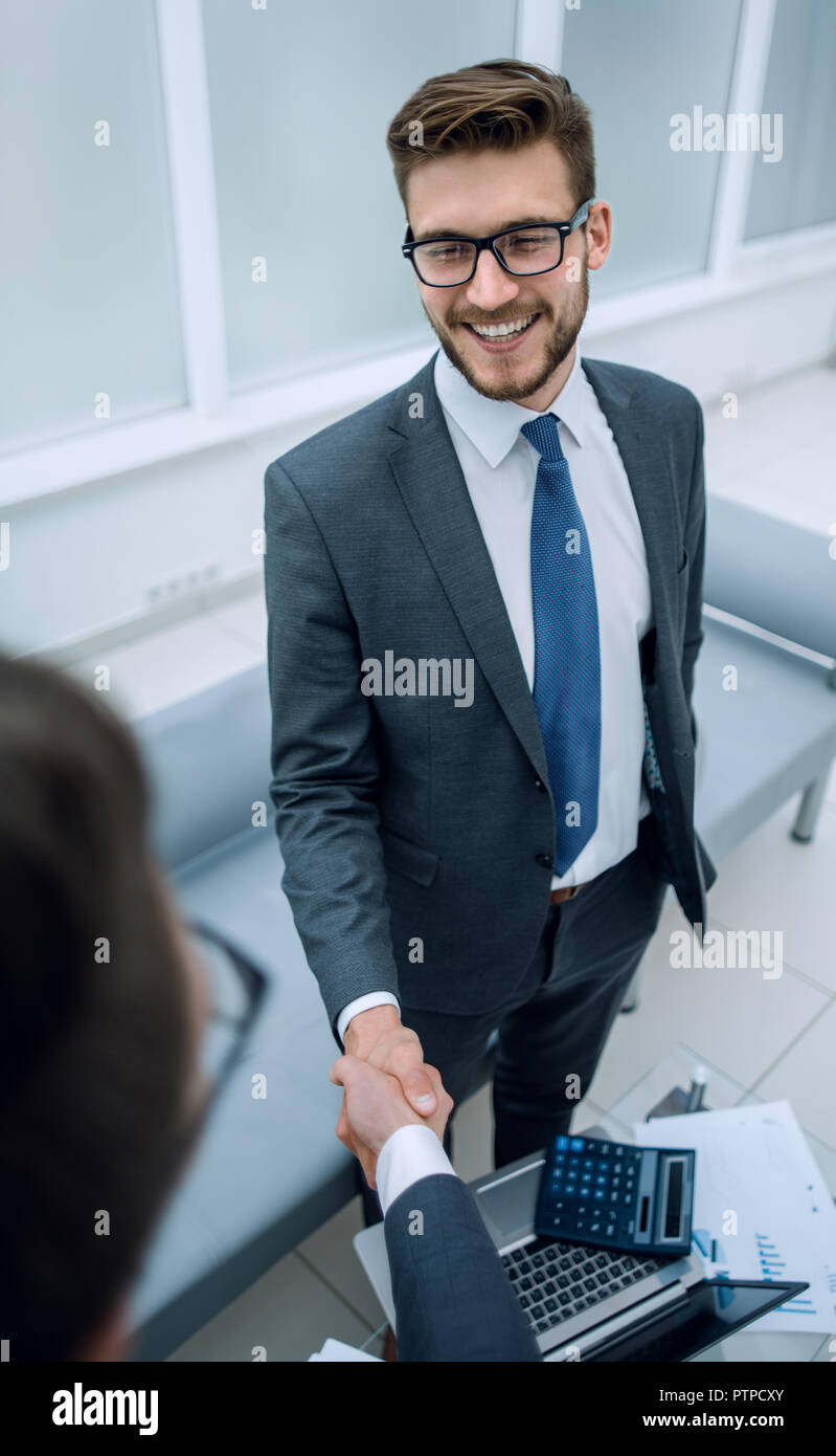 close up.business people greet each other with a handshake Stock Photo ...