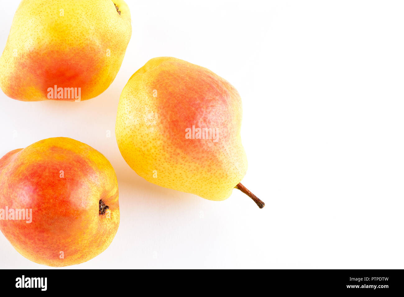 Fresh yellow pears isolated on white background Stock Photo - Alamy