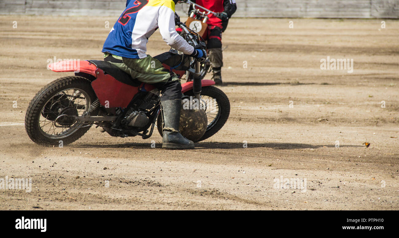Motoball, teens play motoball on motorcycles with a ball, motorcycling ...