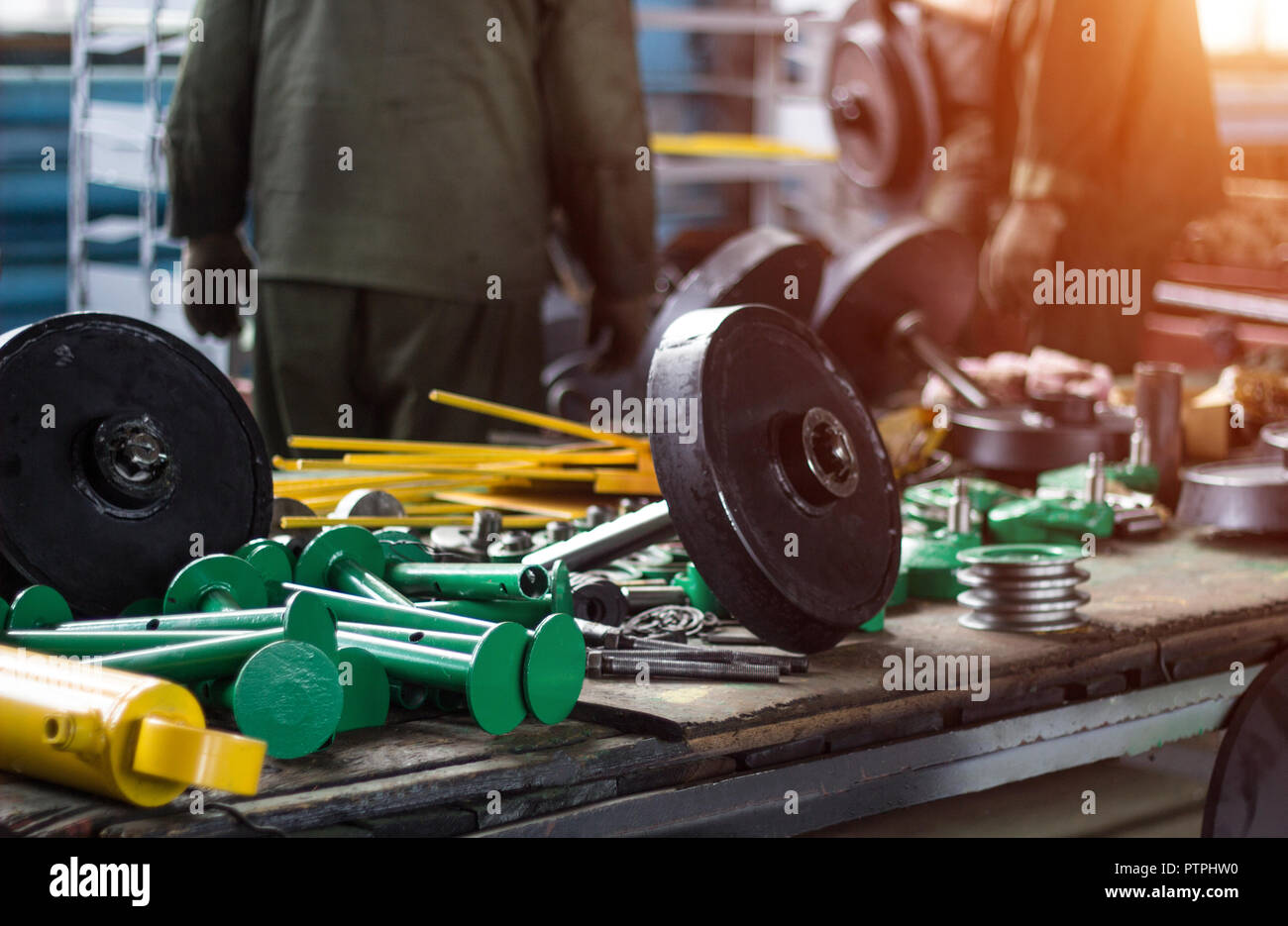 Workers at the plant collect assemblies and units for tractors in the ...