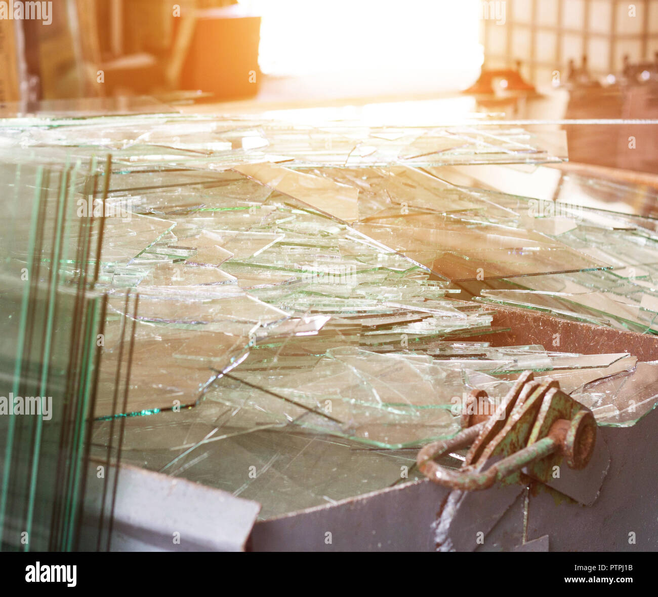 Large container with broken broken glass, manufacturing waste glass ...