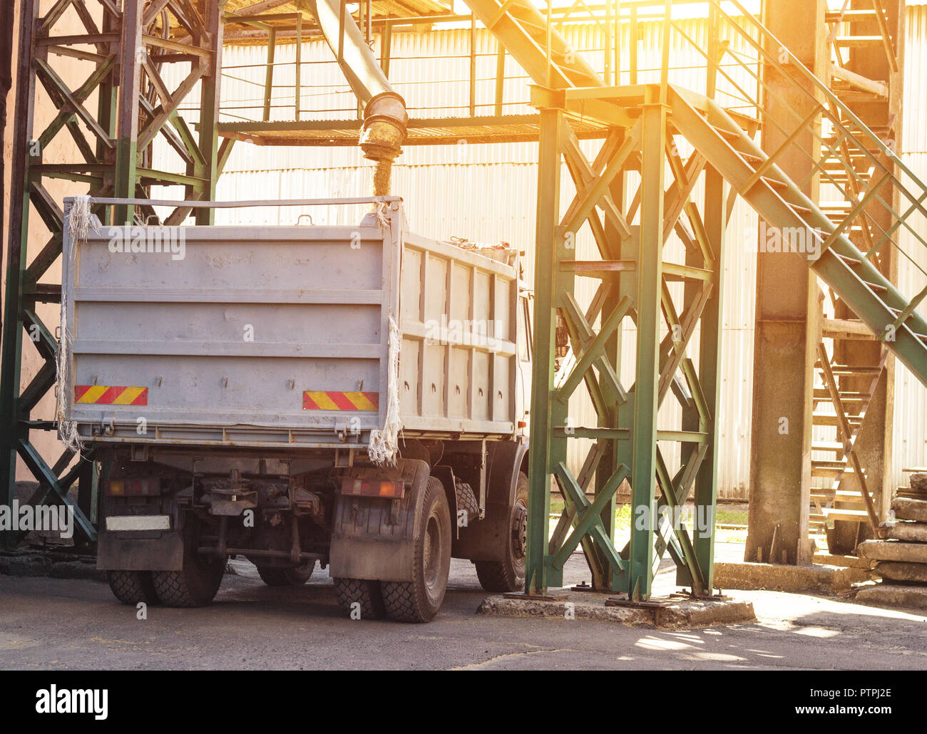 Plant for processing and storing grain, a truck is loaded with grain ...