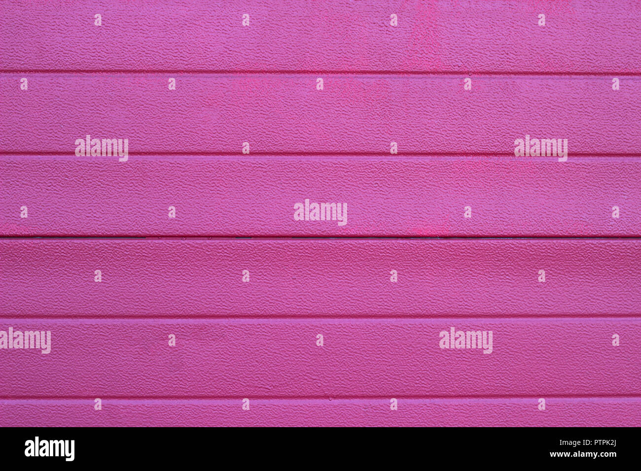 Pink background from plastic, texture Stock Photo - Alamy