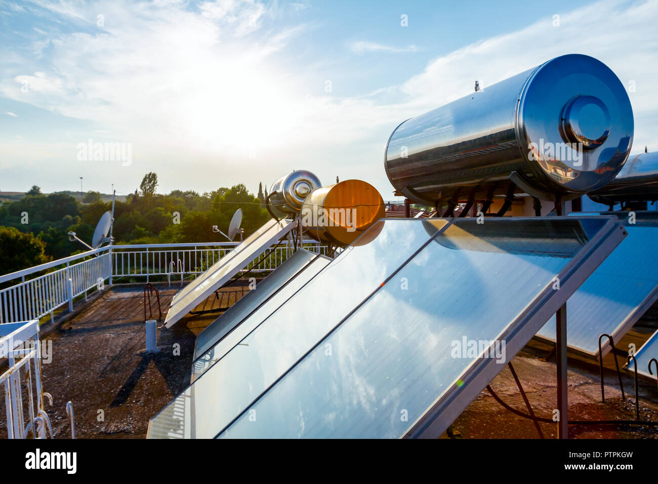 Water panels for using renewable sun energy are placed on house roof ...