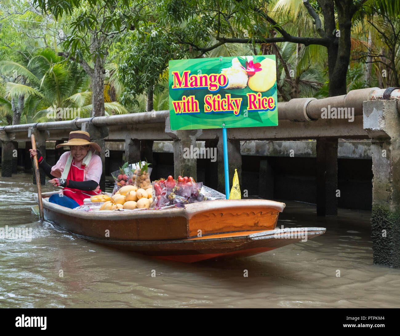 Lady selling mango with sticky rice, Lao Tak Lak Floating Market ...