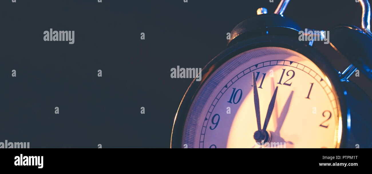 Five minutes to midnight. Changing the clocks, time adjustment ...